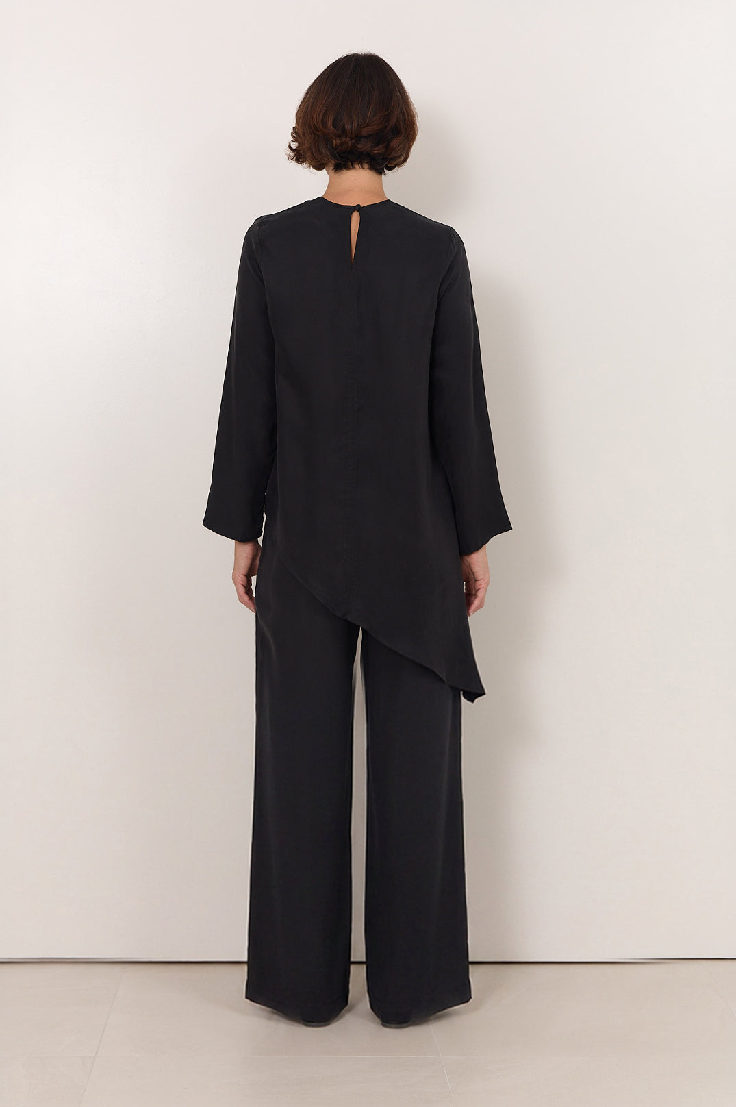 Finley Asymmetric Hem Cupro Top in Black | adorne