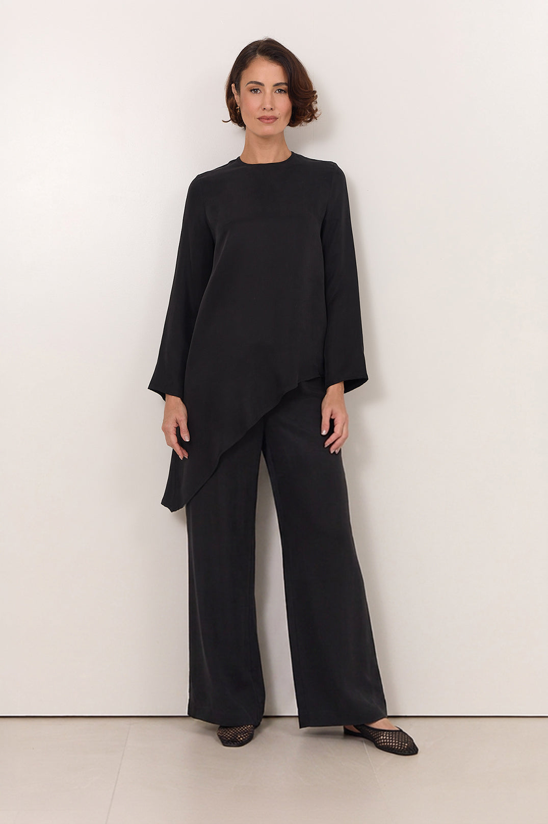 Finley Asymmetric Hem Cupro Top in Black | adorne
